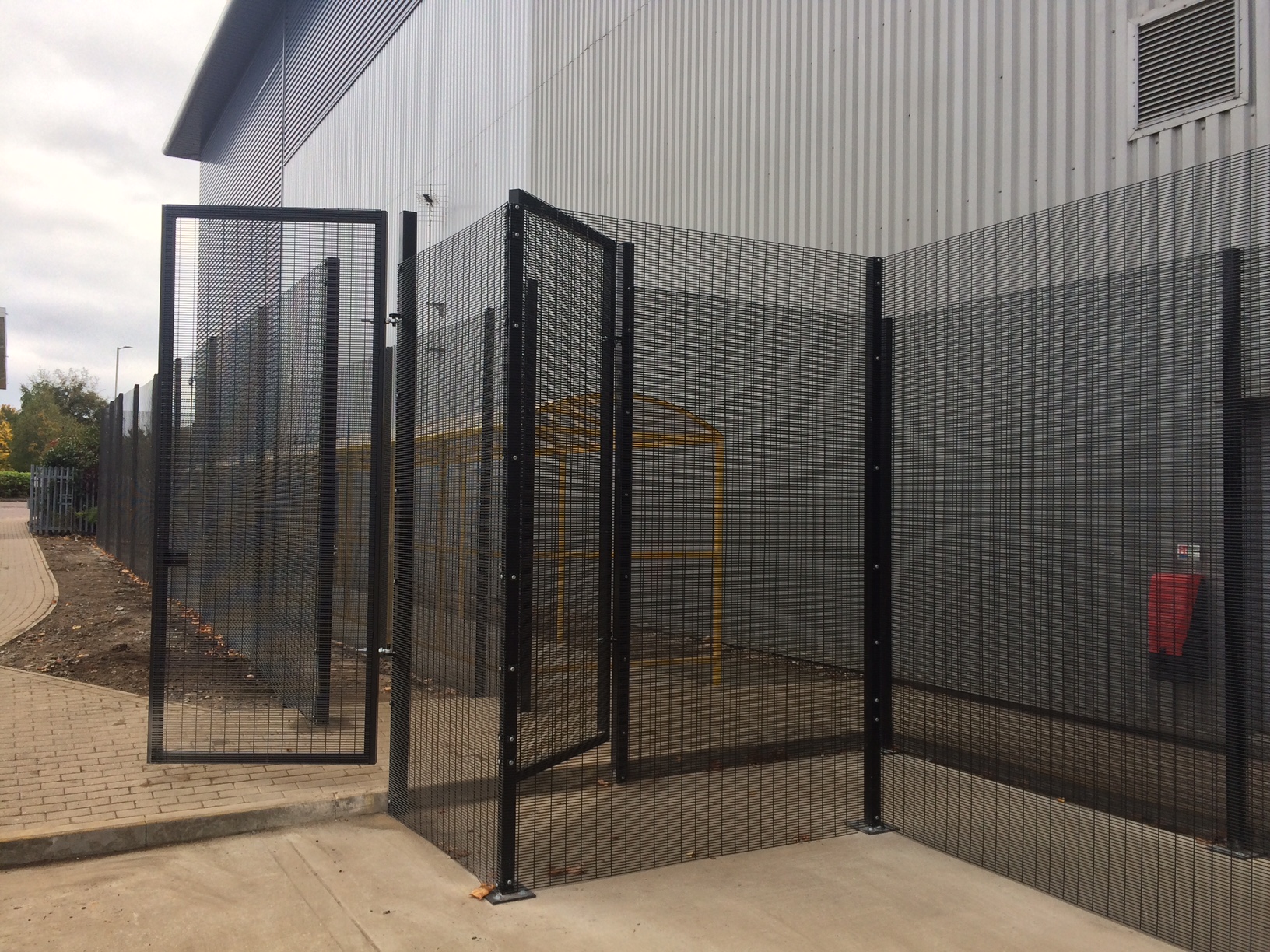 Amazon Security Fencing | Sprint Door Systems - Industrial Door and ...